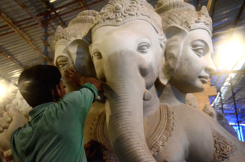 Artists making idols of lord Ganesh