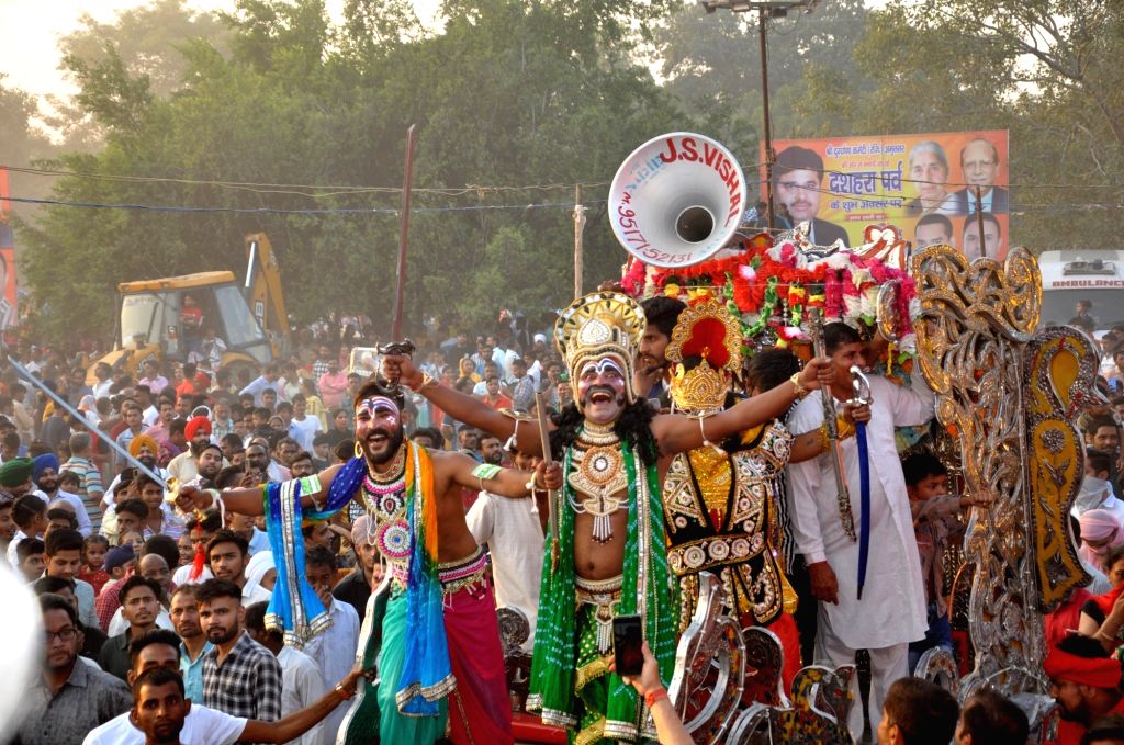 Artists dressed dress up Ravana as they take part in the Dasehra ...