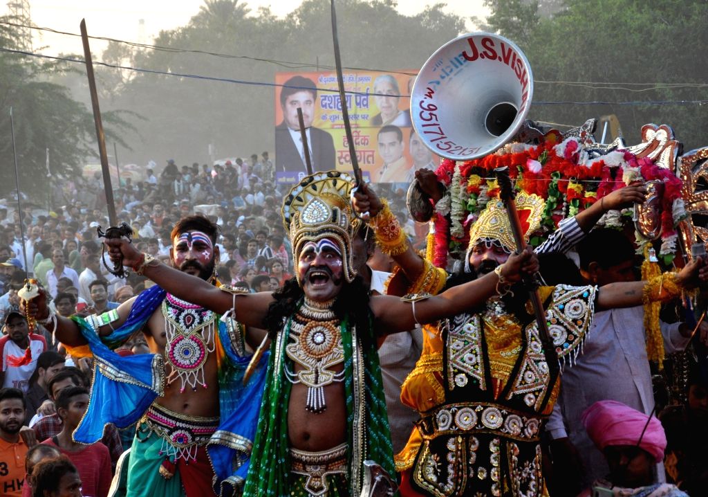 Artists dressed dress up Ravana as they take part in the Dasehra ...