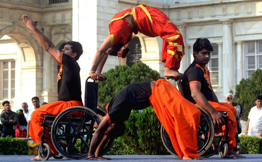 Artists with disabilities from the Wheelchair Dance Troupe perform ...