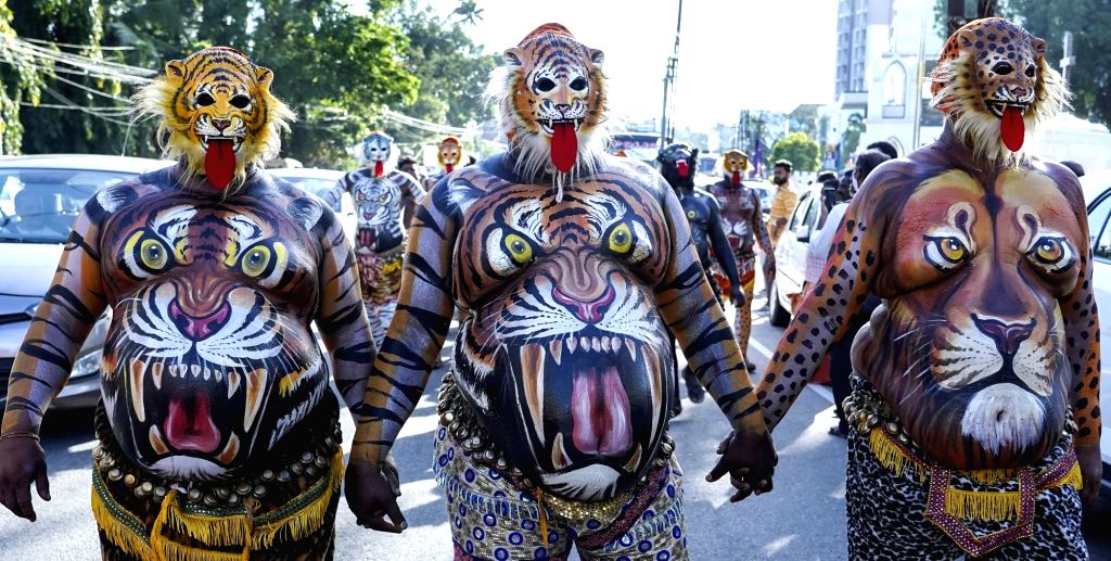 Artists with traditional folk art in their body participate in a ...