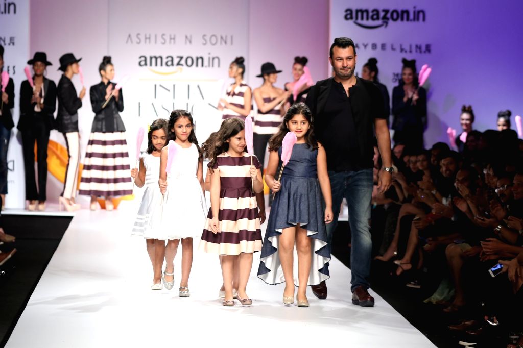 Skating, sliding, giggling: Models turn childlike for Ashish N. Soni