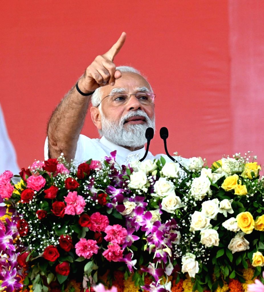 Atkot : Prime Minister Narendra Modi addressing during a public ...