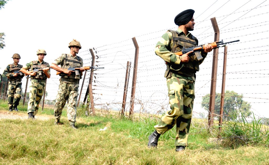 BSF soldiers patrol along Indo-Pak International Border