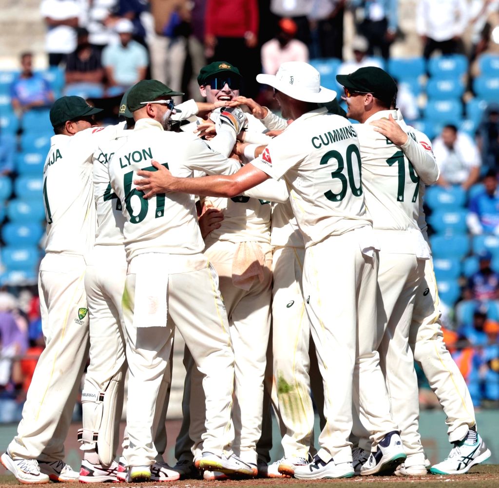 :Nagpur:Australia's Todd Murphy,celebrates with his teammates the ...