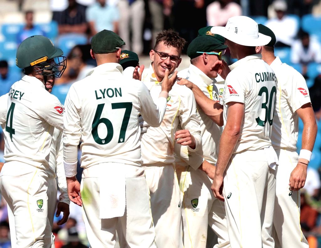 :Nagpur:Australia's Todd Murphy,celebrates with his teammates the ...