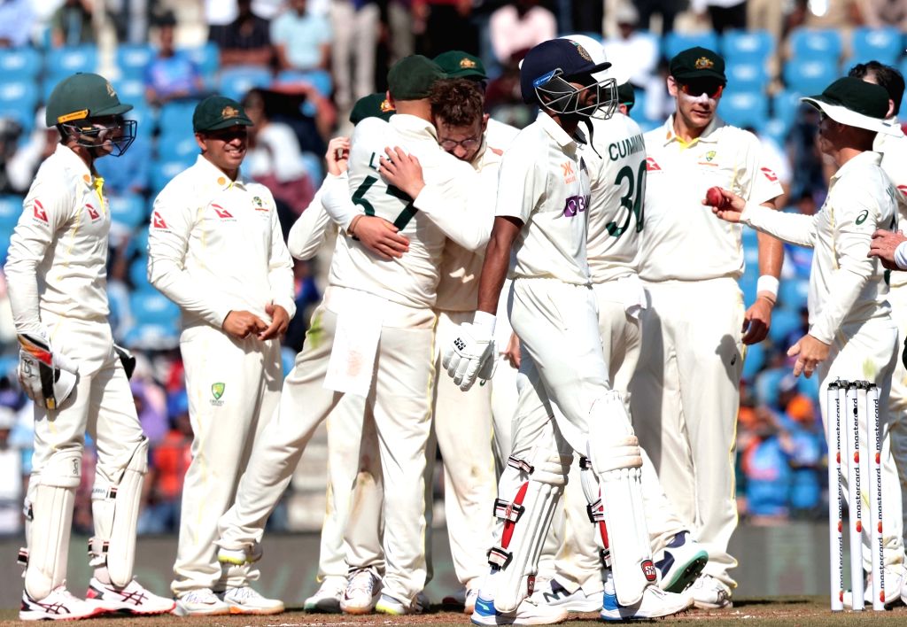 :Nagpur:Australia's Todd Murphy,celebrates with his teammates the ...