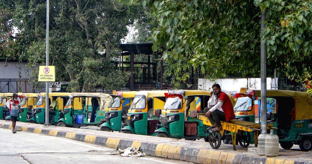 Auto-rickshaws parked at New Delhi Railway Station following a strike ...
