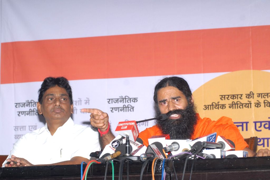 Baba Ramdev addressing a press conference in New Delhi