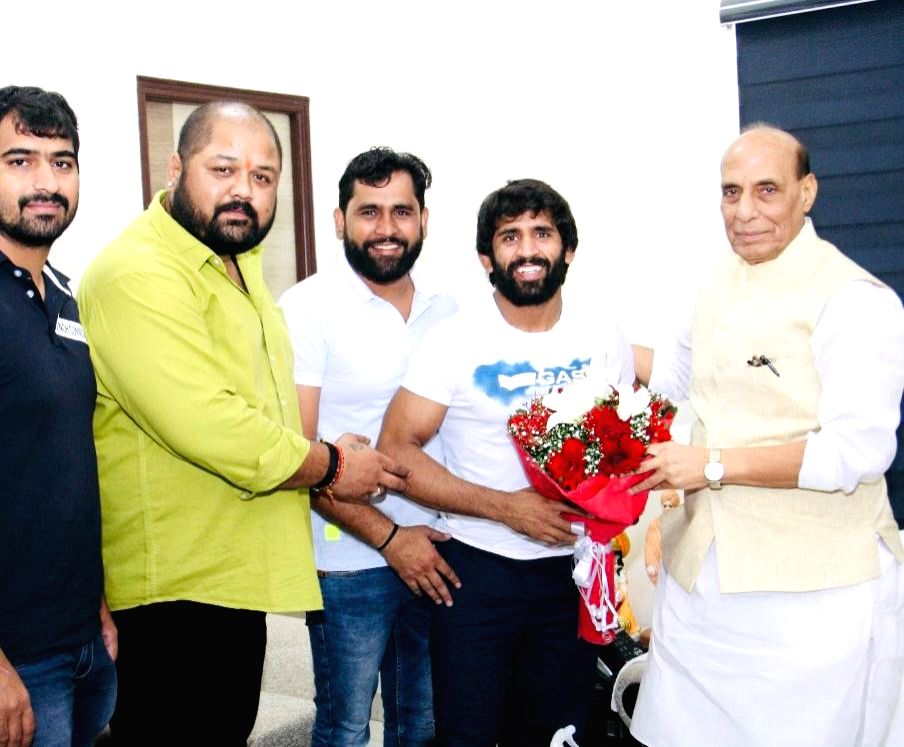 Bajrang Punia, Gaurav Sharma meet Defence Minister Rajnath Singh in Delhi