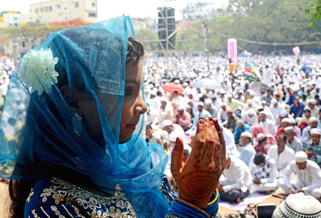 Bengaluru : A girl offers Eid-ul-Fitr Eid-al-Fitr prayers
