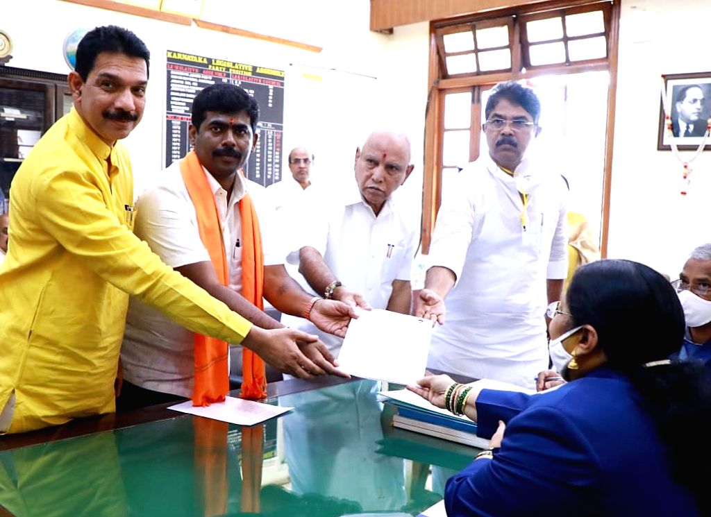 BJP MLC candidate Muniraju Gowda PM submitting his nomination papers to ...