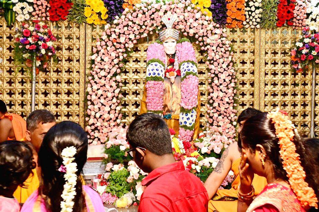 Bengaluru : Devotees visit Sai Baba temple to offer prayers on the ...
