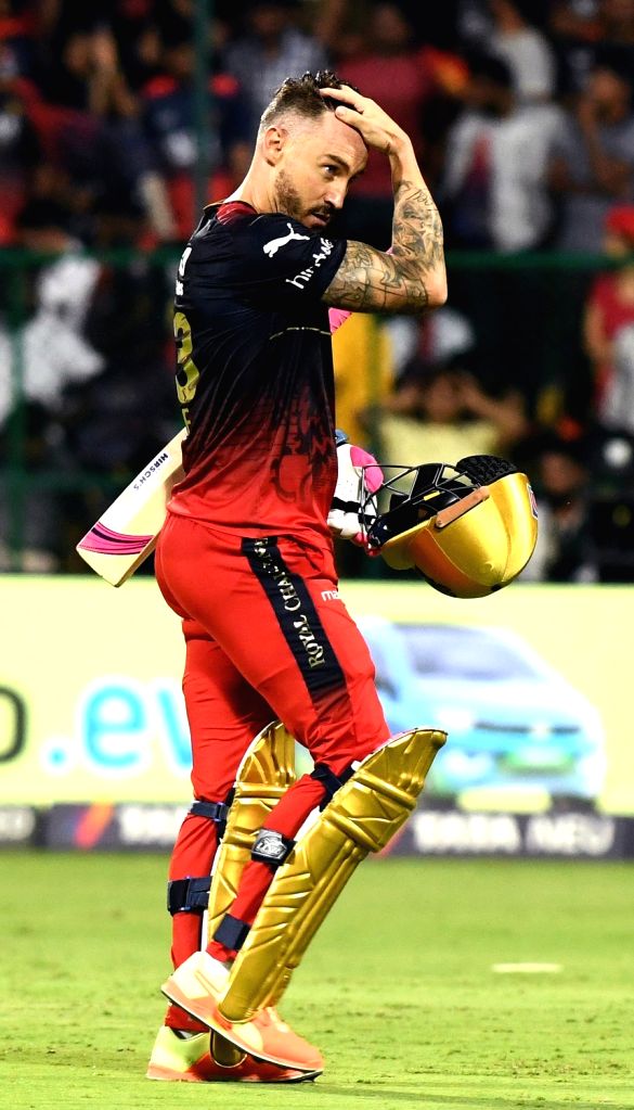 Bengaluru : RCB's Faf du Plessis walks back after the first innings