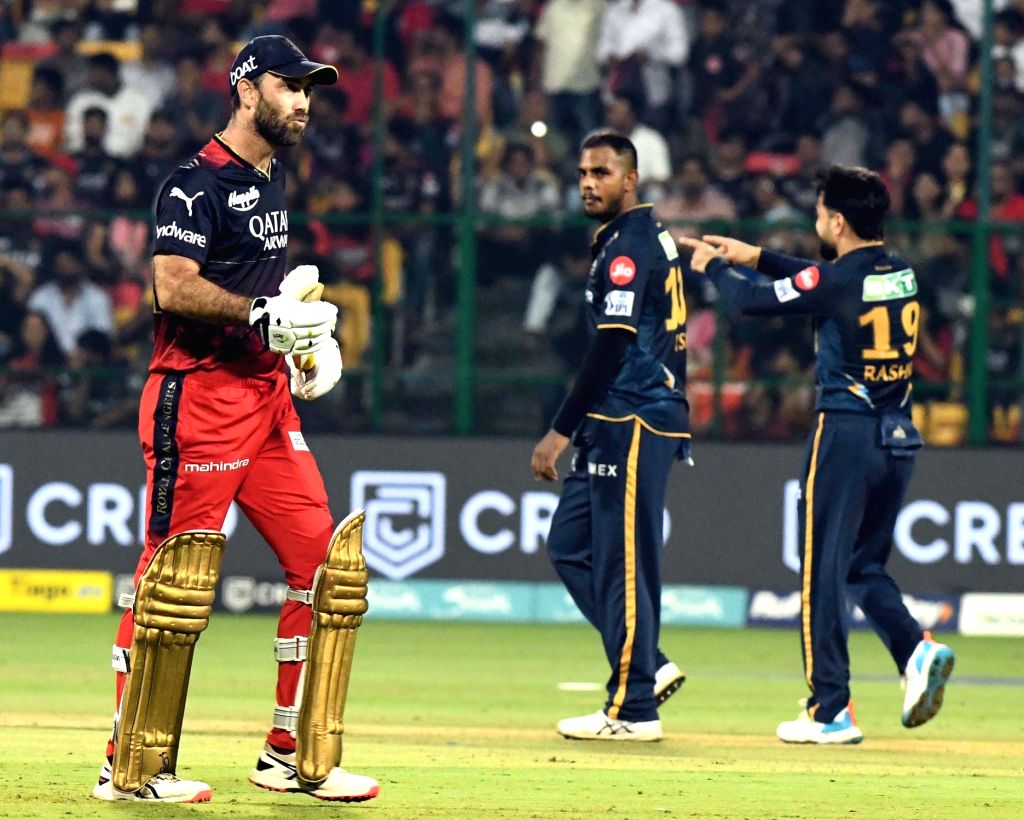 Bengaluru : RCB's batsman Glenn Maxwell walks back after his dismissal