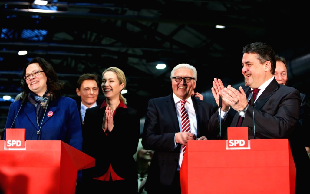 An internal vote of Germany's (SPD) approved a coalition deal with ...
