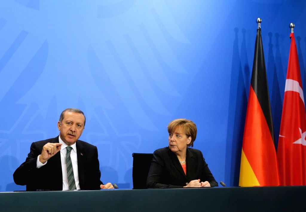 Angela Merkel and Recep Tayyip Erdogan attend a press conference in Berlin