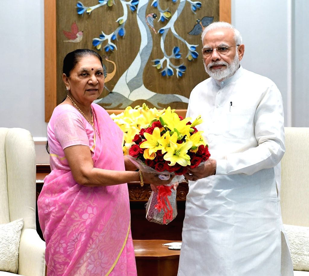 Anandiben takes oath as MP's acting Governor