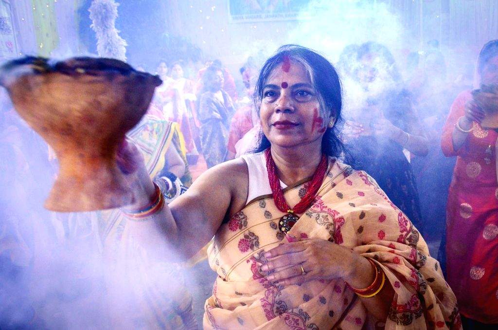 Bhubaneswar : Women devotees participate in 'Sindoor Khela' on the last ...