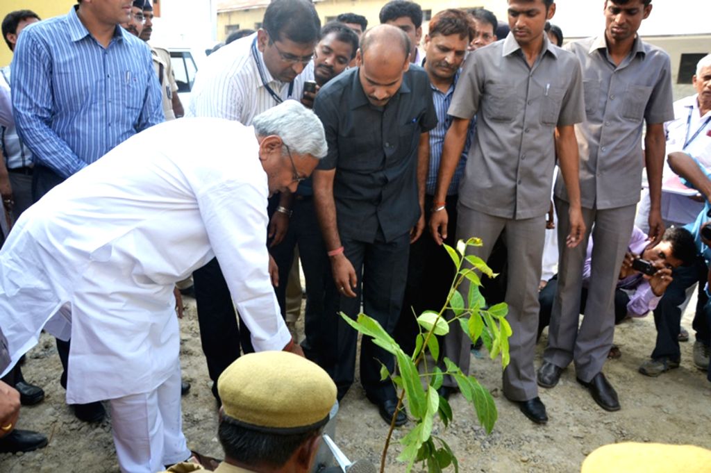 Bihar Chief Minister Nitish Kumar being garlanded in a public meeting