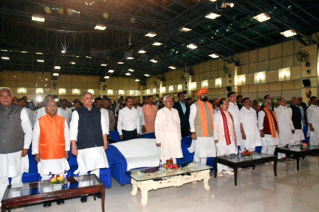 Bihar Chief Minister Nitish Kumar with his deputies Vijay Kumar Sinha ...