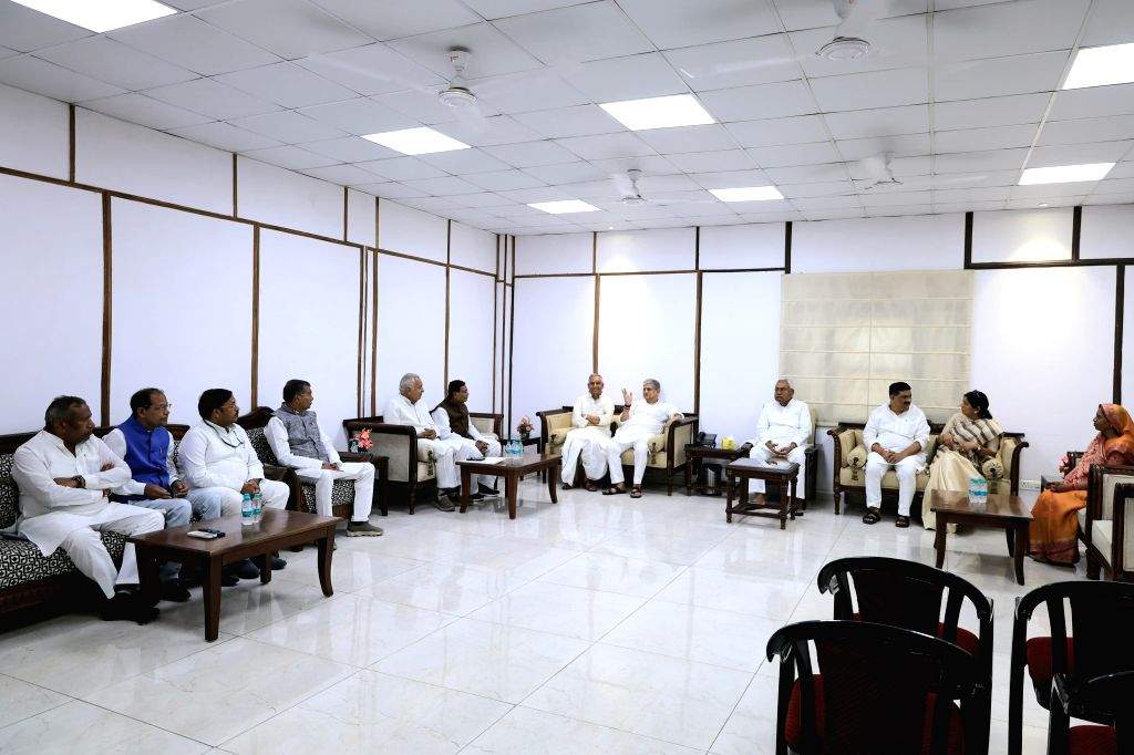 Bihar Chief Minister Nitish Kumar with newly elected party MPs during a ...