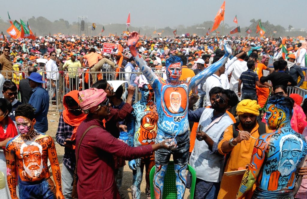 BJP activists at Brigade Parade Ground to attend Indian Prime minister ...