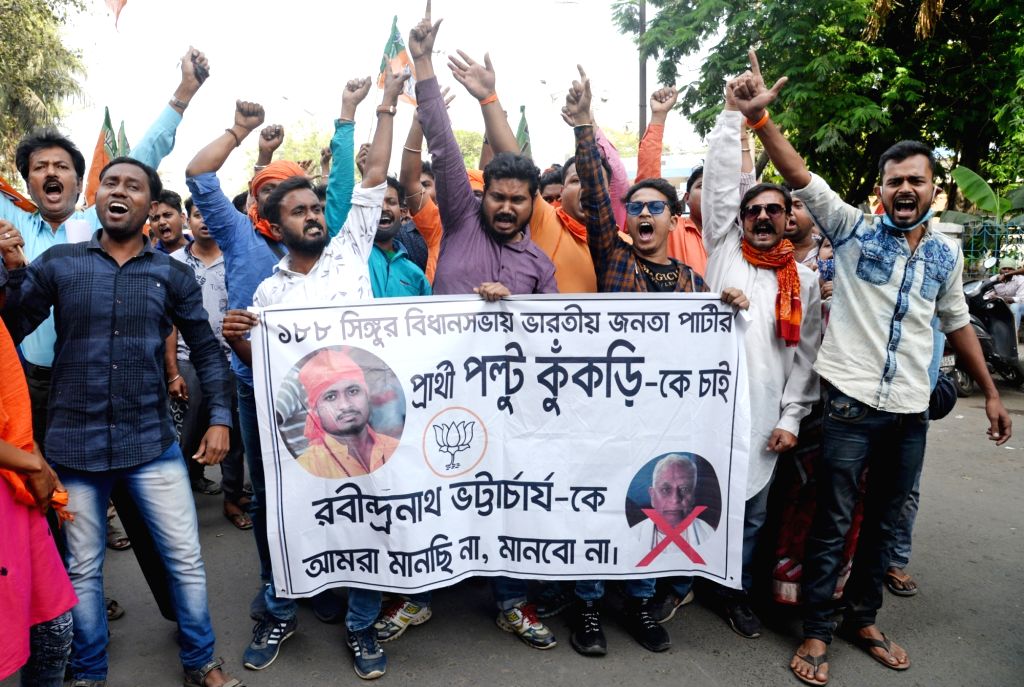BJP activists from various constituencies shout slogans to protest ...