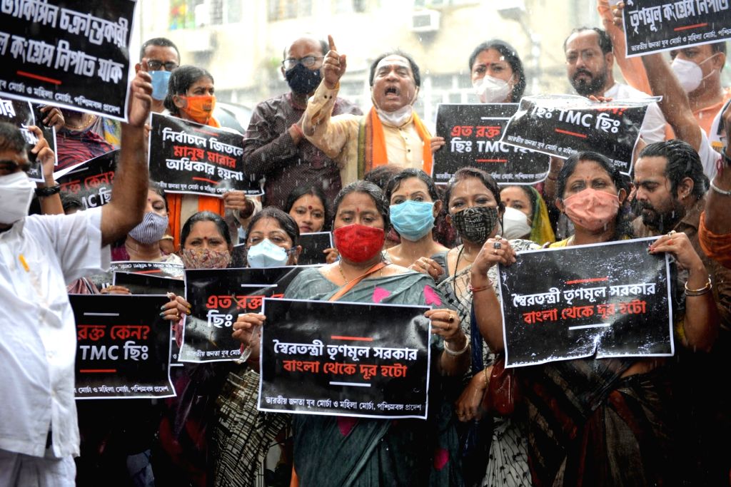 BJP activists took part in a protest rally against the fake vaccination ...