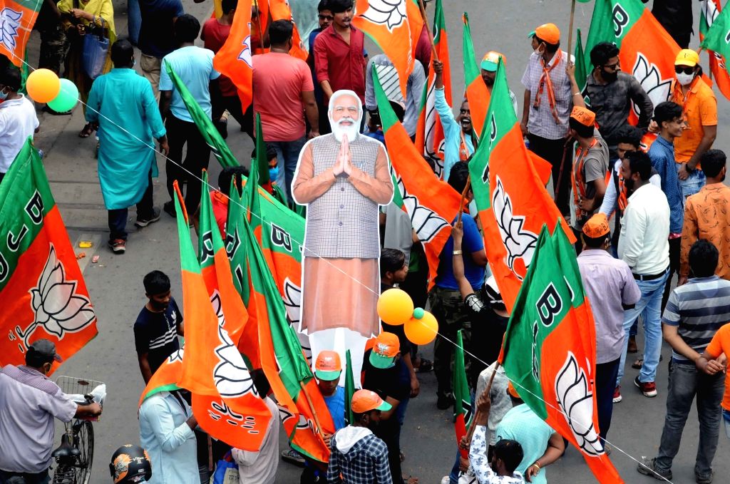 BJP activists took part in a rally during the election campaign for ...
