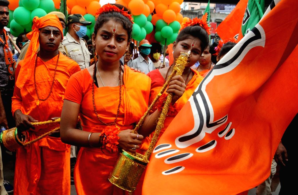 BJP activists took part in a rally during the election campaign for ...