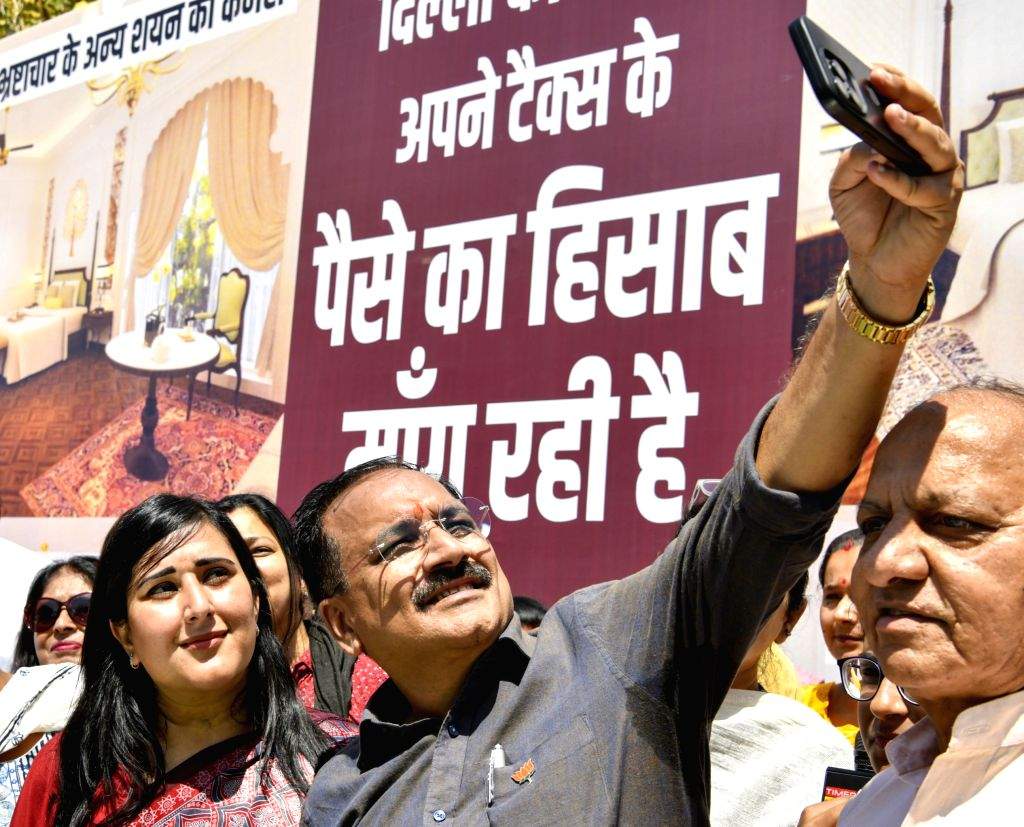 BJP cadres and Delhi party president Virendraa Sachdeva hold ‘Sharab se ...