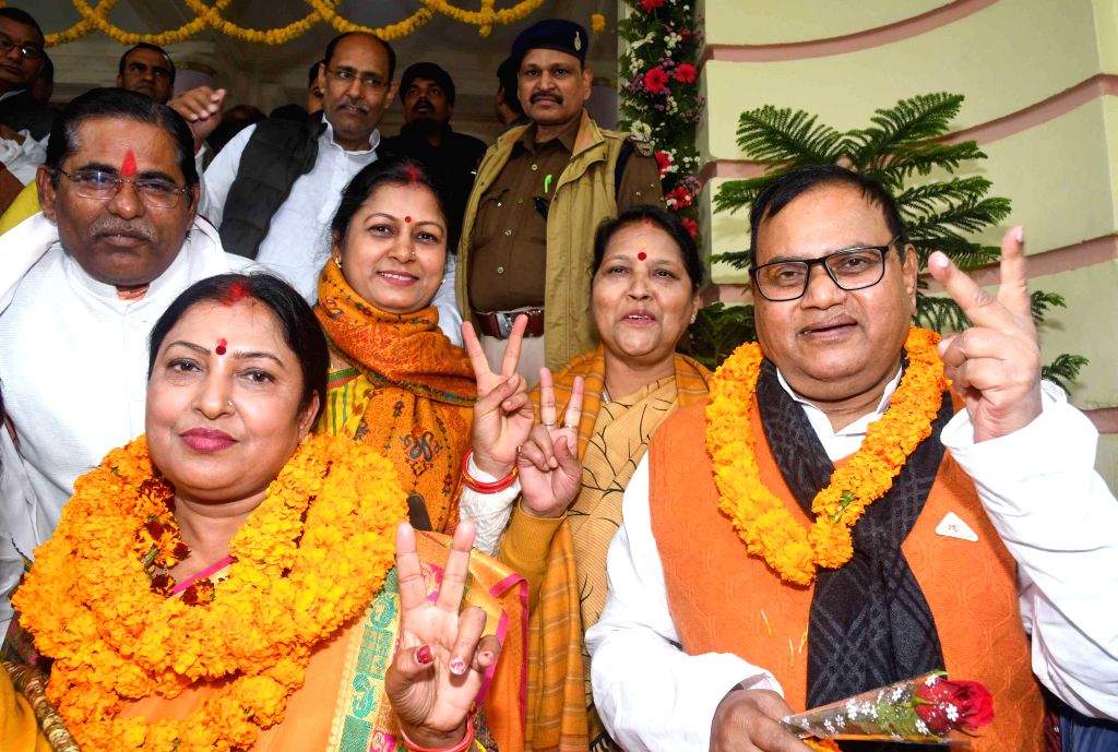 BJP candidates Dharmsheela Gupta and Bhim Singh flash victory signs ...