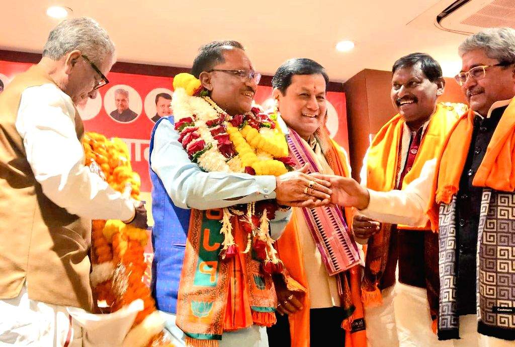 BJP leader Vishnu Deo Sai being garlanded by party leaders after he was ...