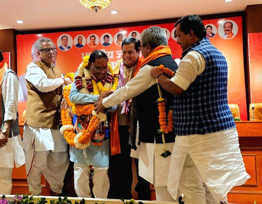 BJP leader Vishnu Deo Sai being garlanded by party leaders after he was ...