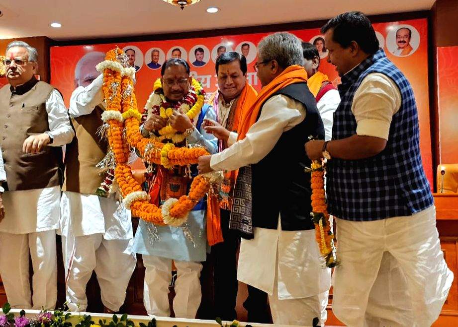 BJP leader Vishnu Deo Sai being garlanded by party leaders after he was ...