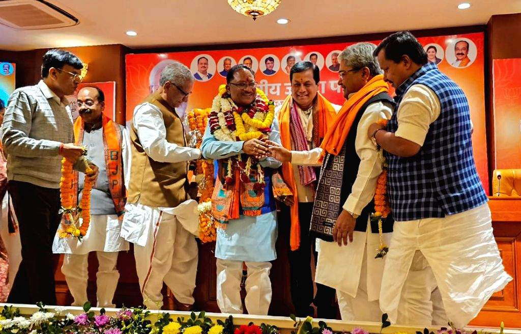 BJP leader Vishnu Deo Sai being garlanded by party leaders after he was ...