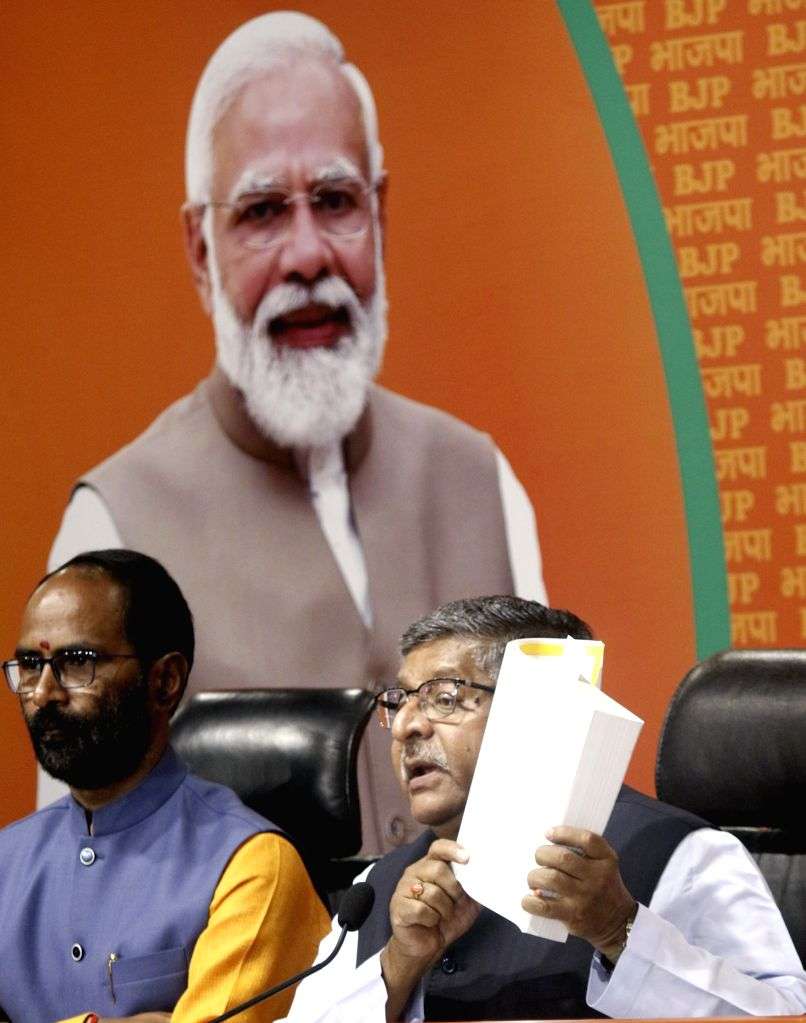 BJP leaders Ravi Shankar Prasad and Sambit Patra address a press ...
