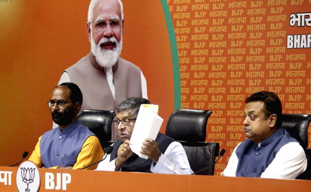 BJP leaders Ravi Shankar Prasad and Sambit Patra address a press ...
