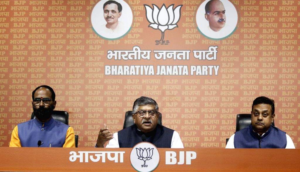 BJP leaders Ravi Shankar Prasad and Sambit Patra address a press ...