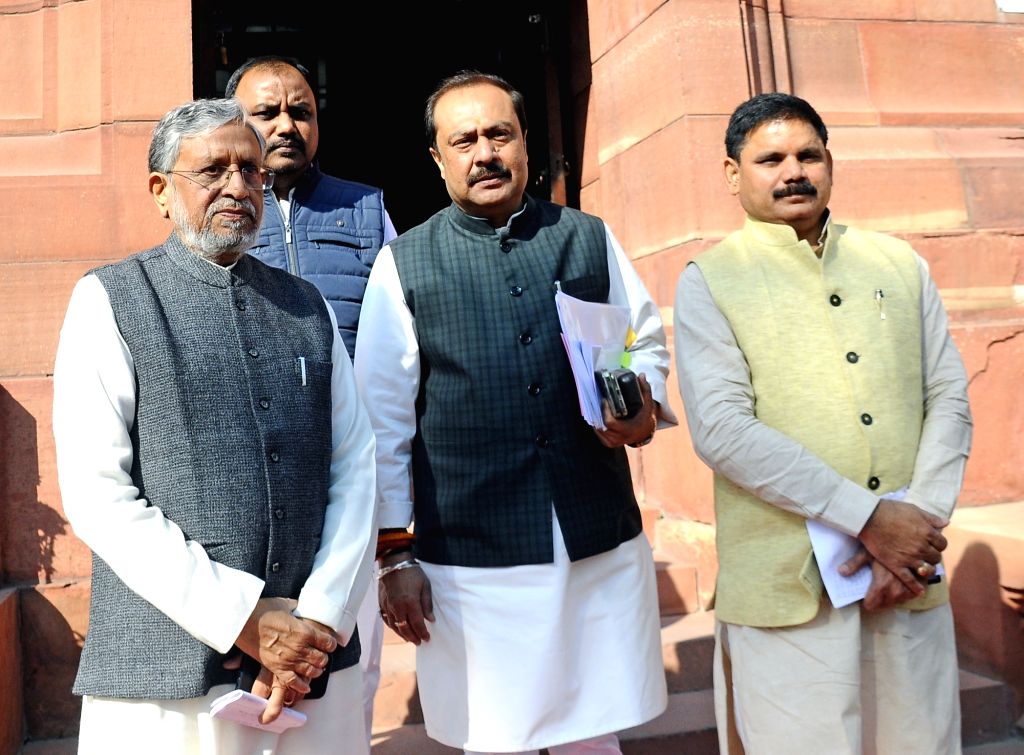 BJP MP Sushil Kumar Modi with other MPs at the Parliament complex