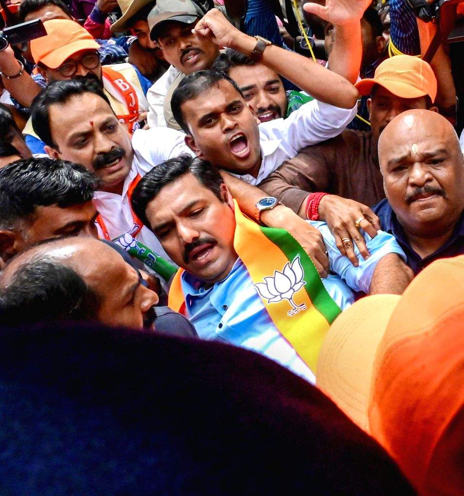 BJP State President B.Y. Vijayendra, along with party leaders stages a ...
