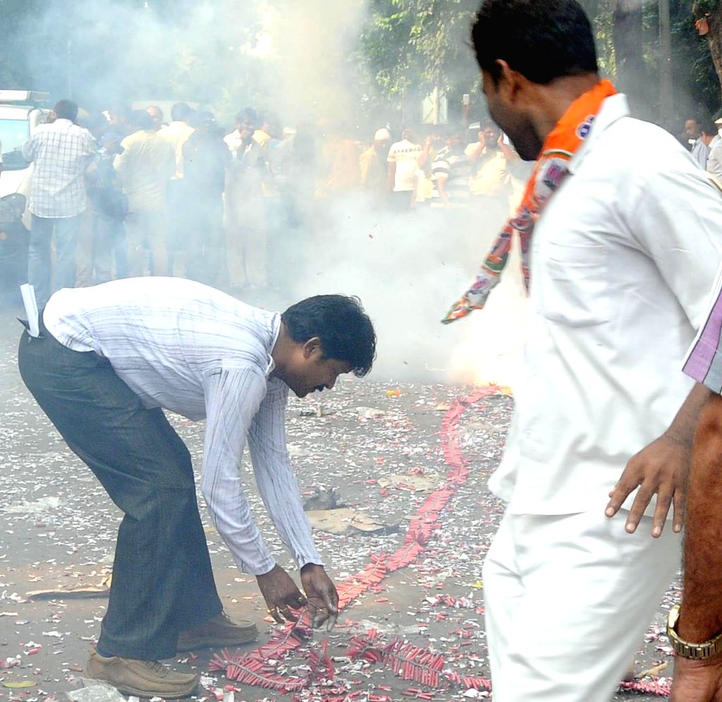 BJP supporters celebrate as Dr. Harsh Vardhan becomes chief ministerial ...