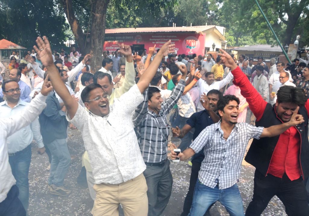 BJP supporters celebrate as Dr. Harsh Vardhan becomes chief ministerial ...