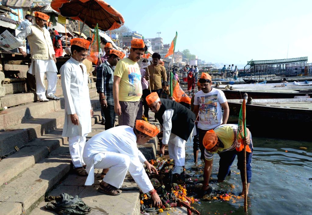 BJP workers clean Ganga banks ahead of Modi's visit