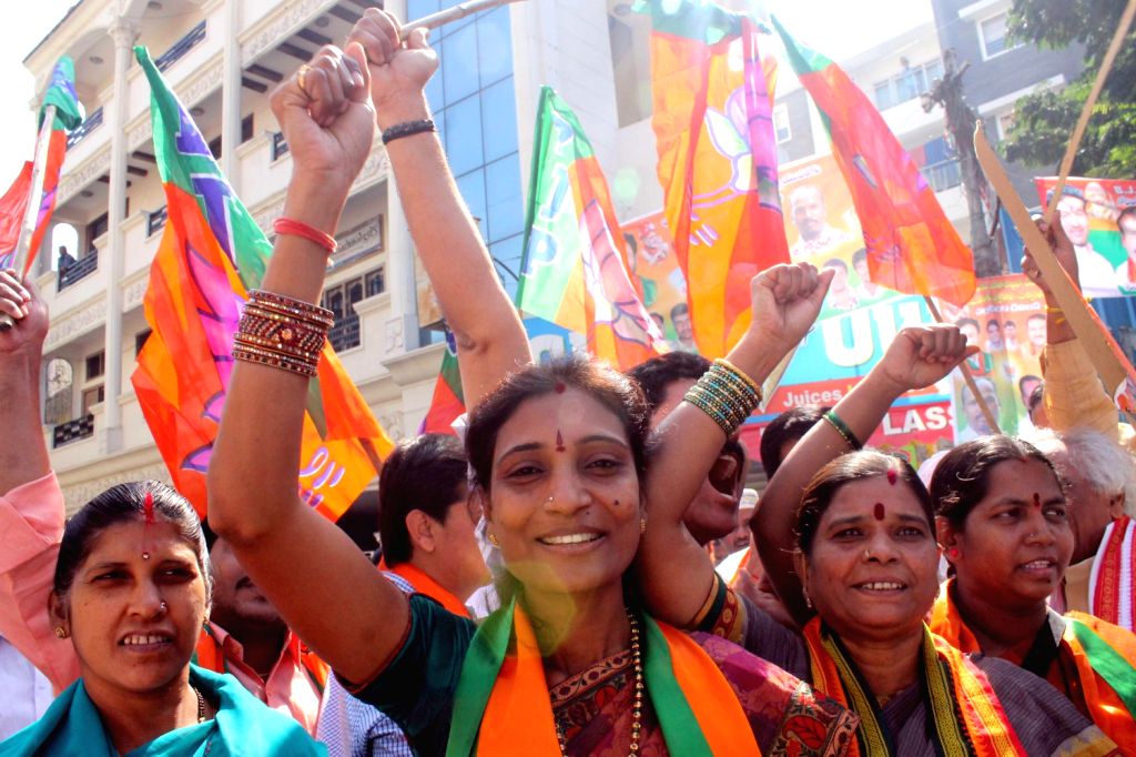 BJP workers celebrate party's performance in the Assembly polls of 4 states
