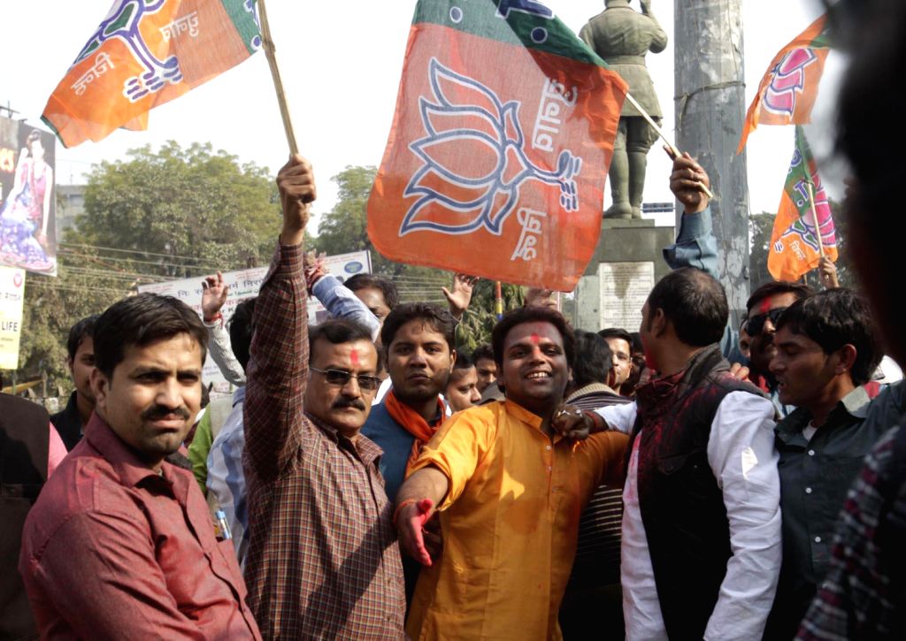 BJP workers celebrate party's performance in the Assembly polls of 4 states