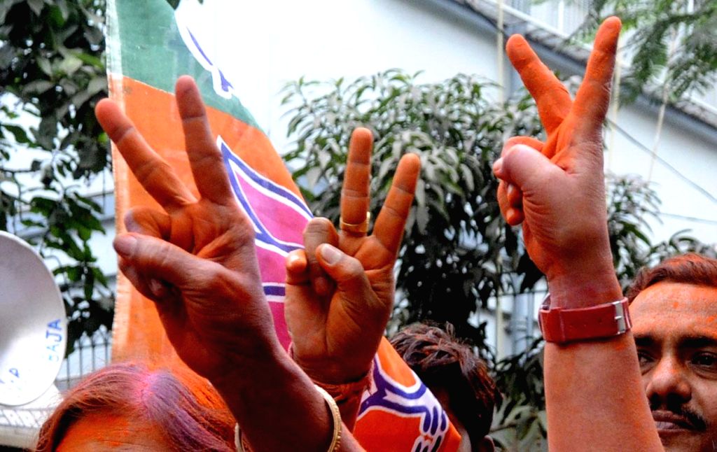 BJP workers celebrate party's performance in the Assembly polls of 4 states