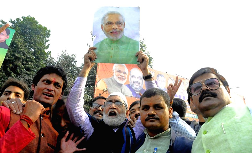BJP workers celebrate â party's performance in Himachalâ and Gujarat polls