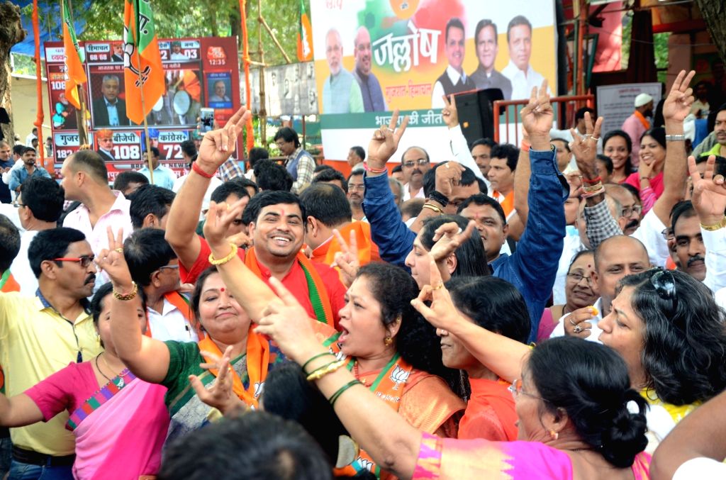 BJP workers celebrate party's performance in Himachal and Gujarat polls